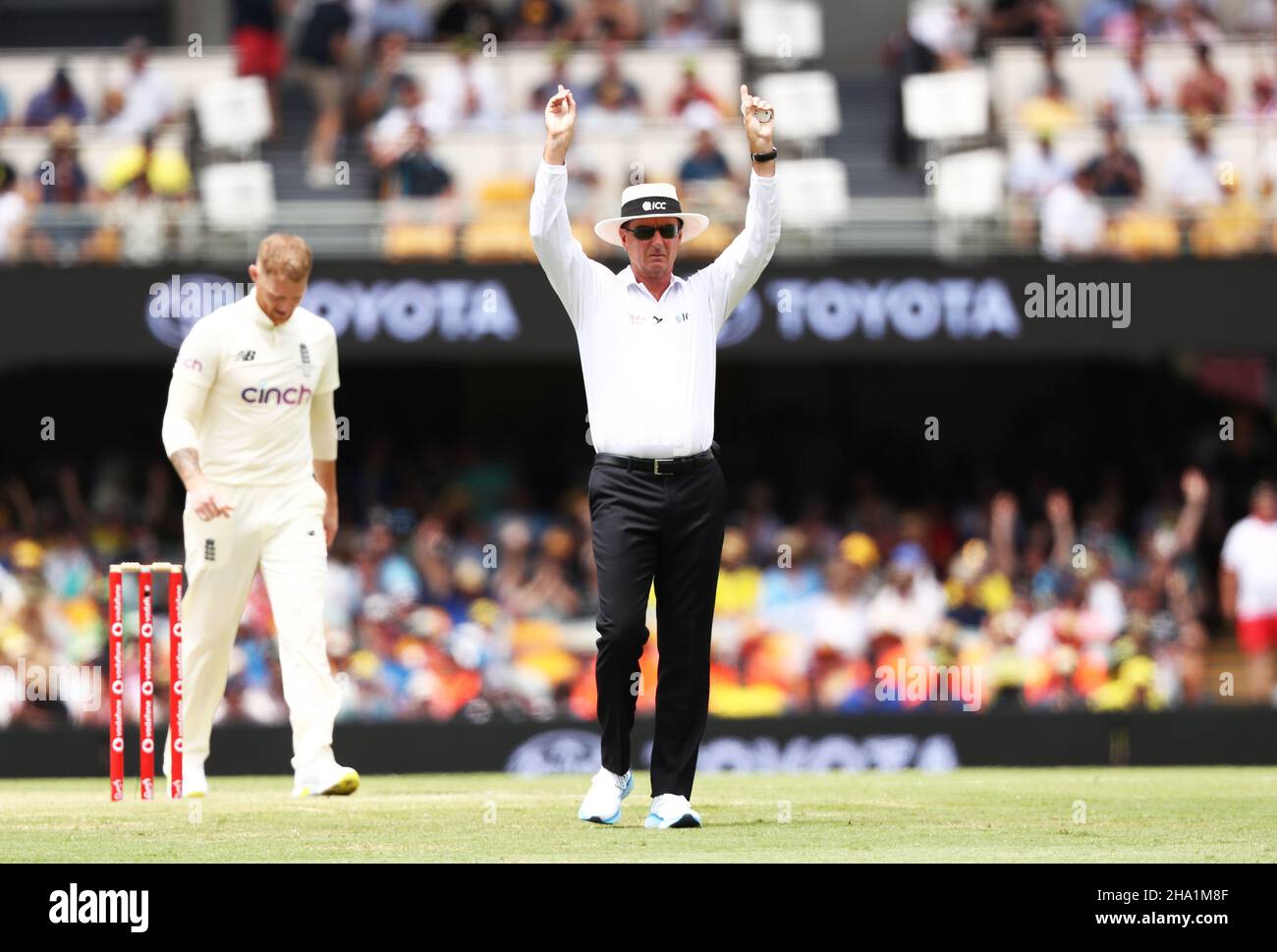 Umpire Rod Tucker signals a six as Ben Stokes ( Left )looks on during ...