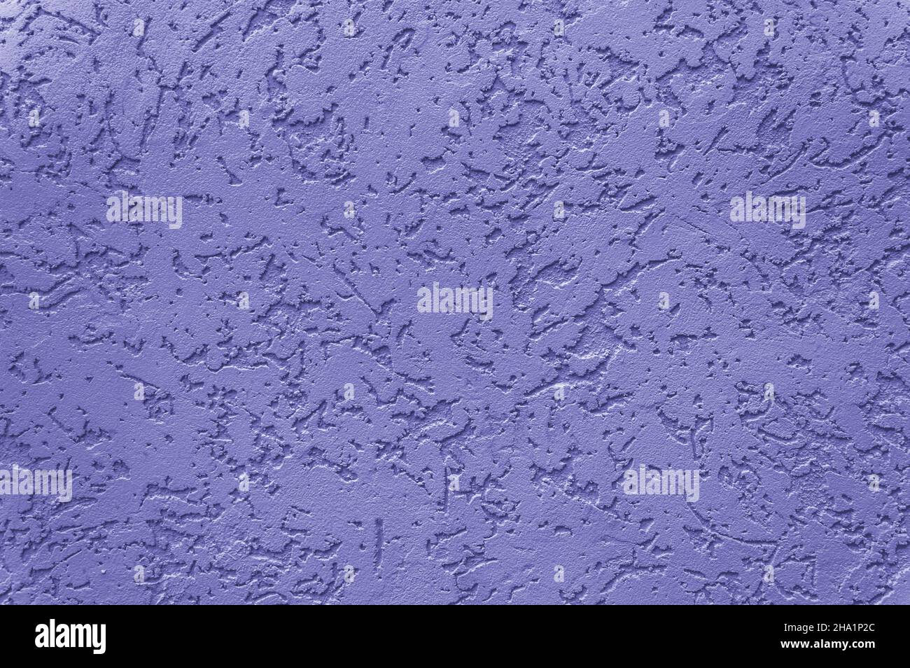 Textured concrete wall background toned in trendy Very Peri color of ...