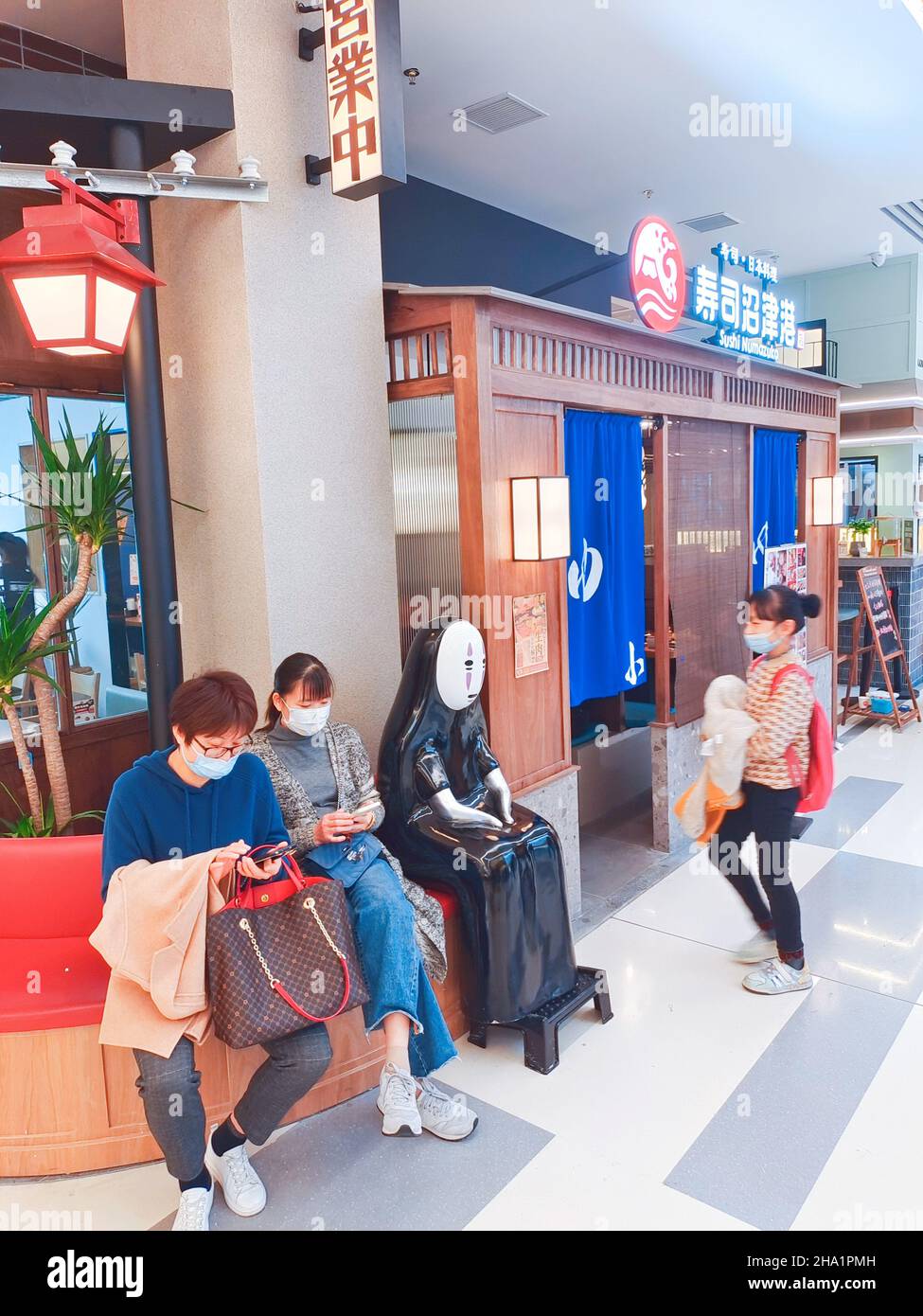 SHANGHAI, CHINA - NOVEMBER 28, 2021 - The faceless Man (sculpture), a ...