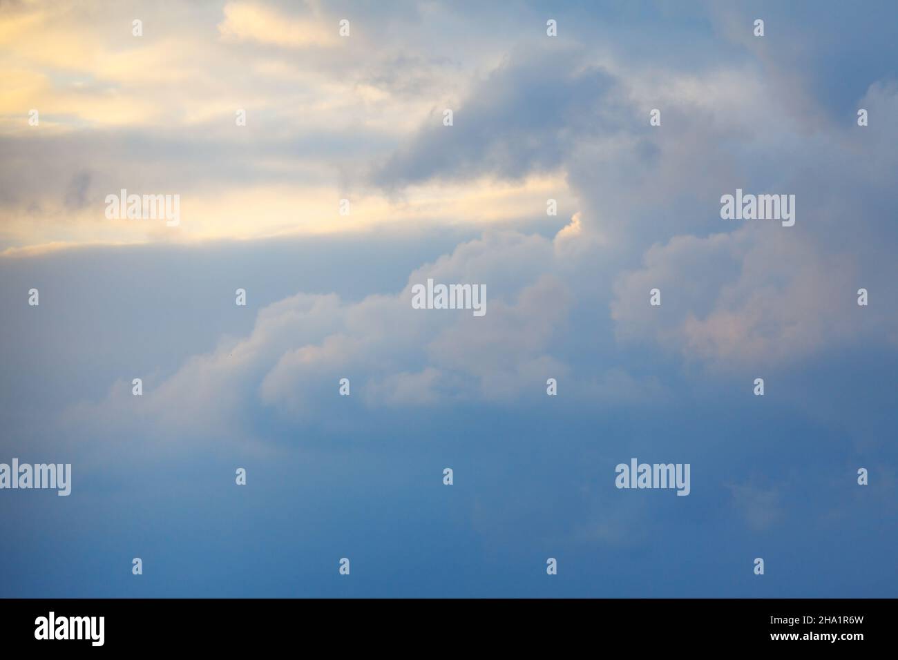 Blue and yellow clouds in the morning Stock Photo - Alamy