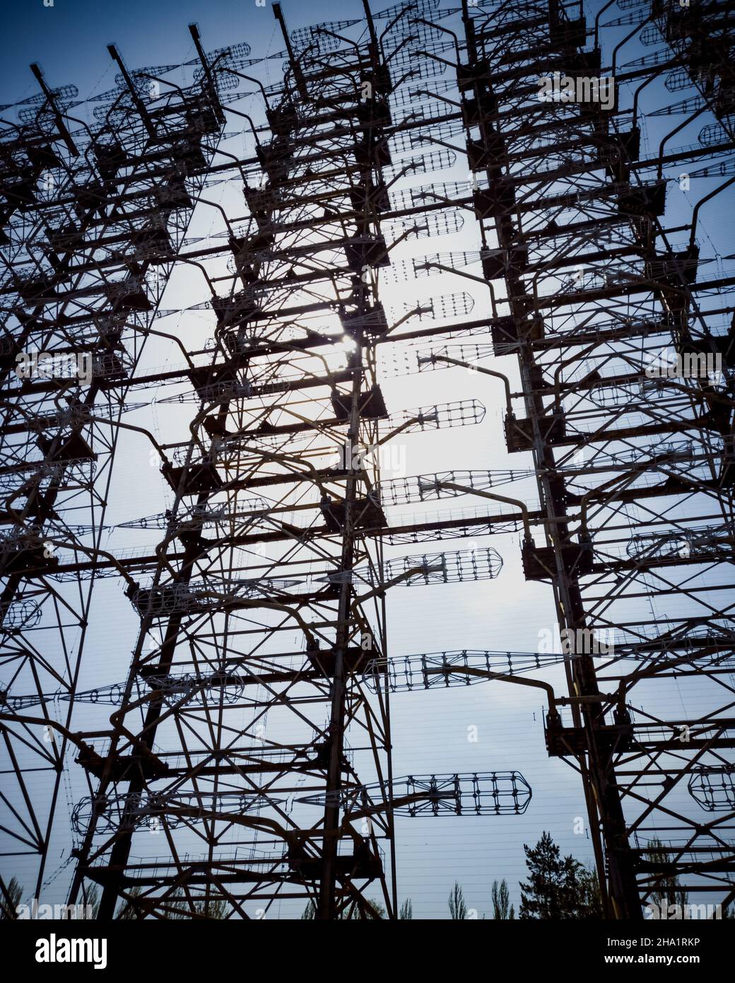 Vertical low angle shot of tall industrial telephone towers Stock Photo ...