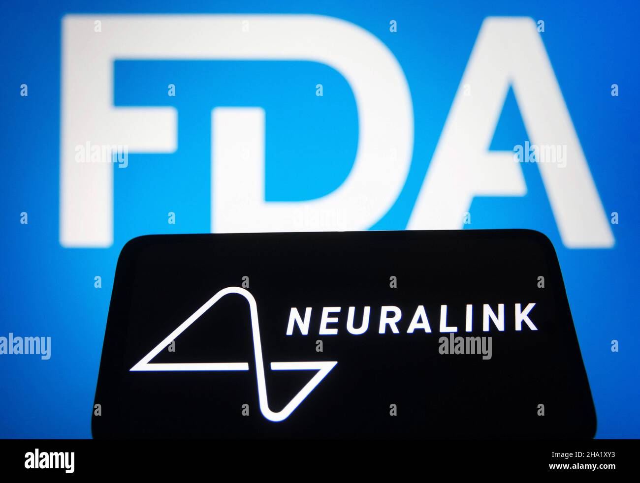 In this photo illustration, a Neuralink Corporation logo of a ...