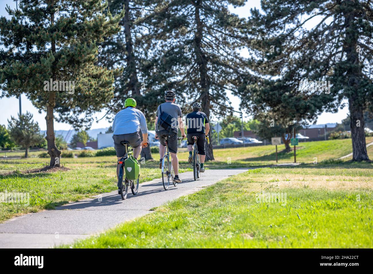 Three men crossing the road hi-res stock photography and images - Alamy