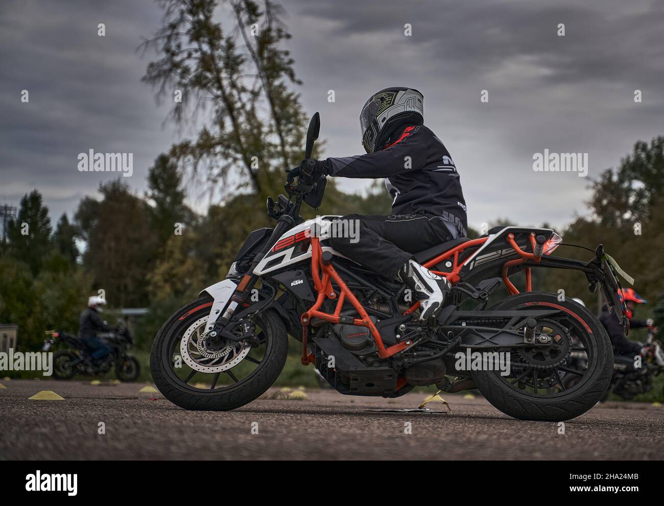 19-09-2021 Riga, Latvia A young man riding a motorcycle on an open road ...