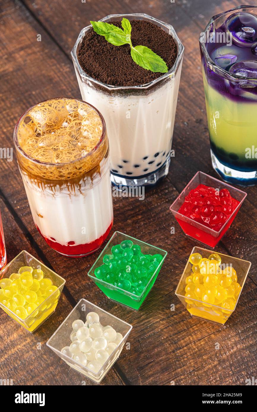 Lemonade with bubble tea on wooden background Stock Photo - Alamy
