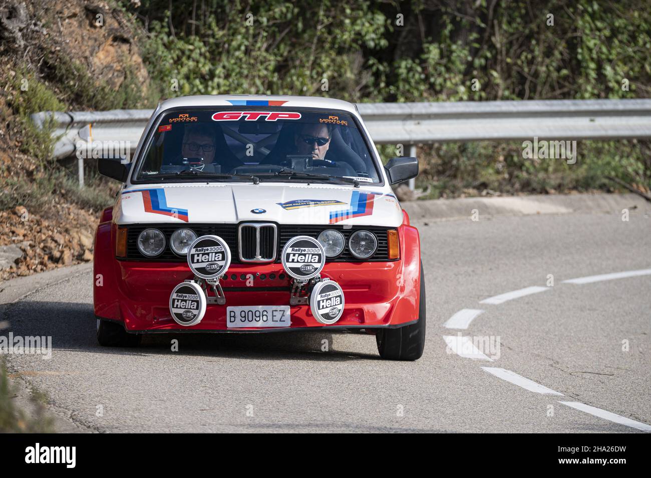 BARCELONA, SPAIN - Nov 11, 2021: A man driving BMW E21 VIII Rallye on a ...