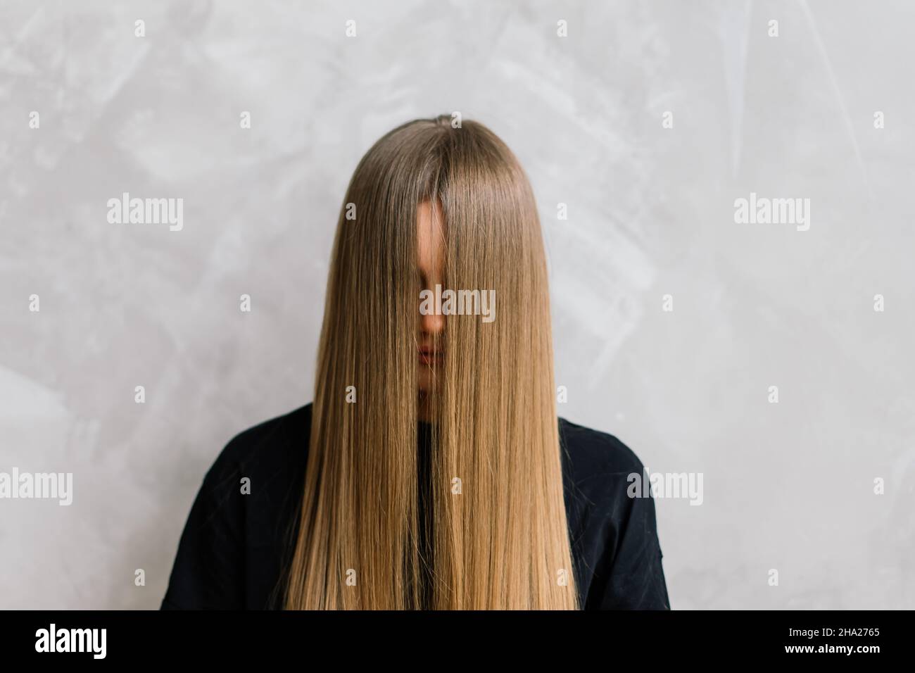 Girl Touching Her Hair And Smiling While Posing At Interior Looking In 6127