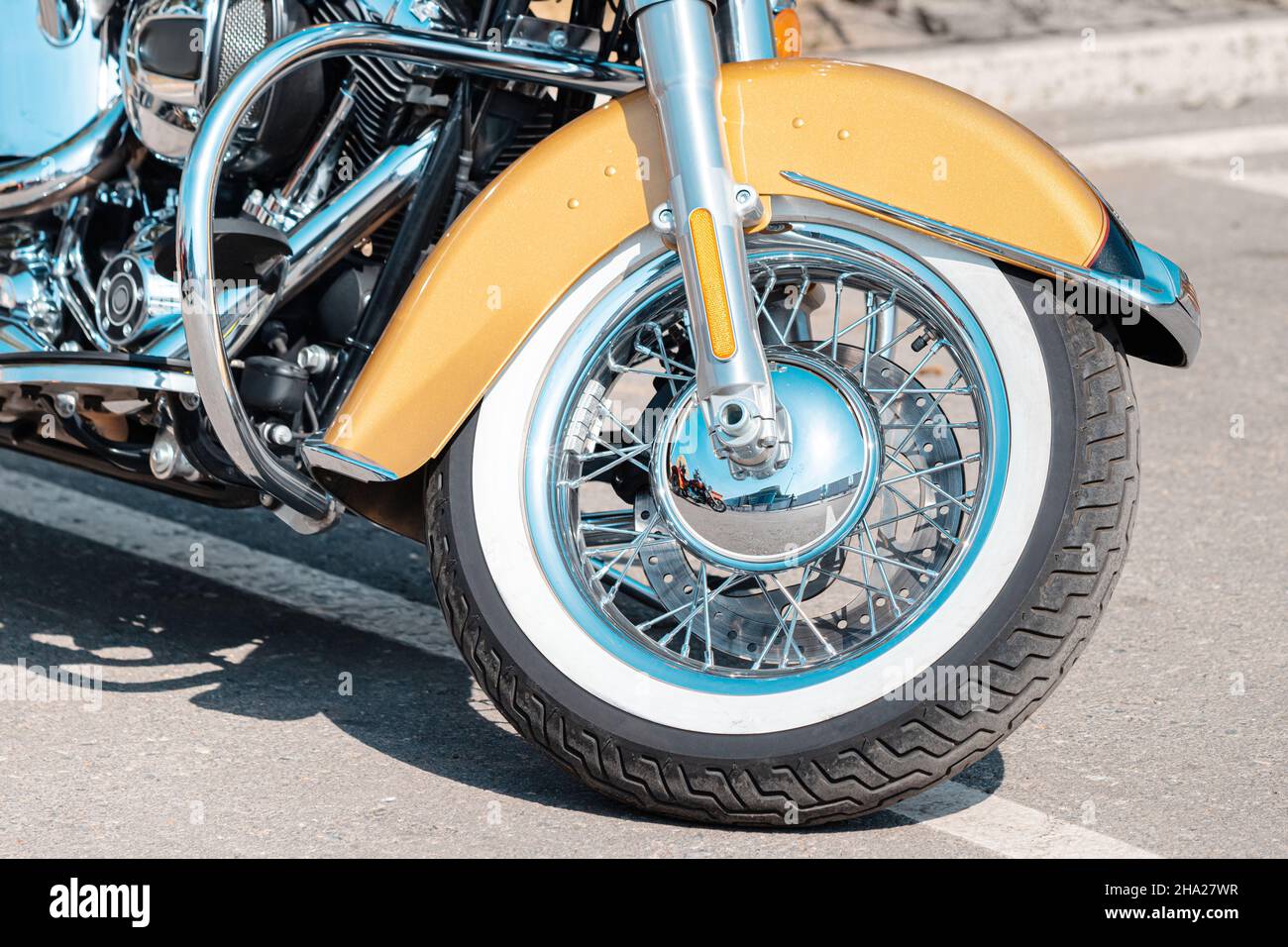 Motorcycle wheel with spokes and shiny chrome details. Chic and ...