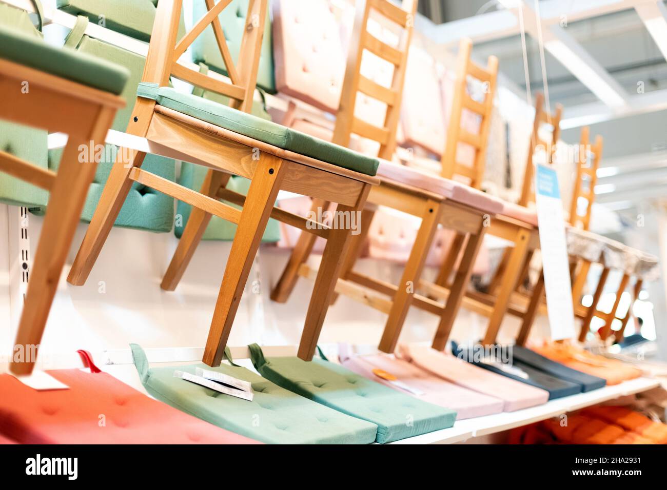 Wooden chairs on the display of a furniture store Stock Photo - Alamy