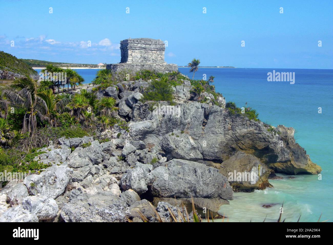 Rocky cliff on the shore of the Caribbean in Tulum, Mexico Stock Photo ...