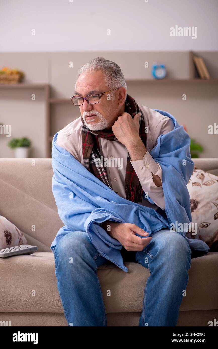 Sick old man coughing sitting hi-res stock photography and images - Alamy