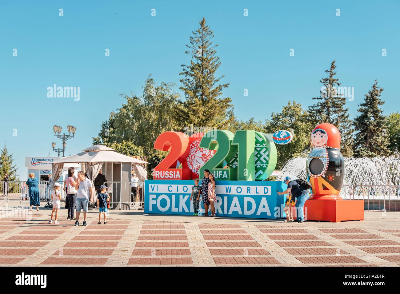 06 July 2021, Ufa, Russia: People wearing face masks at the entrance to ...