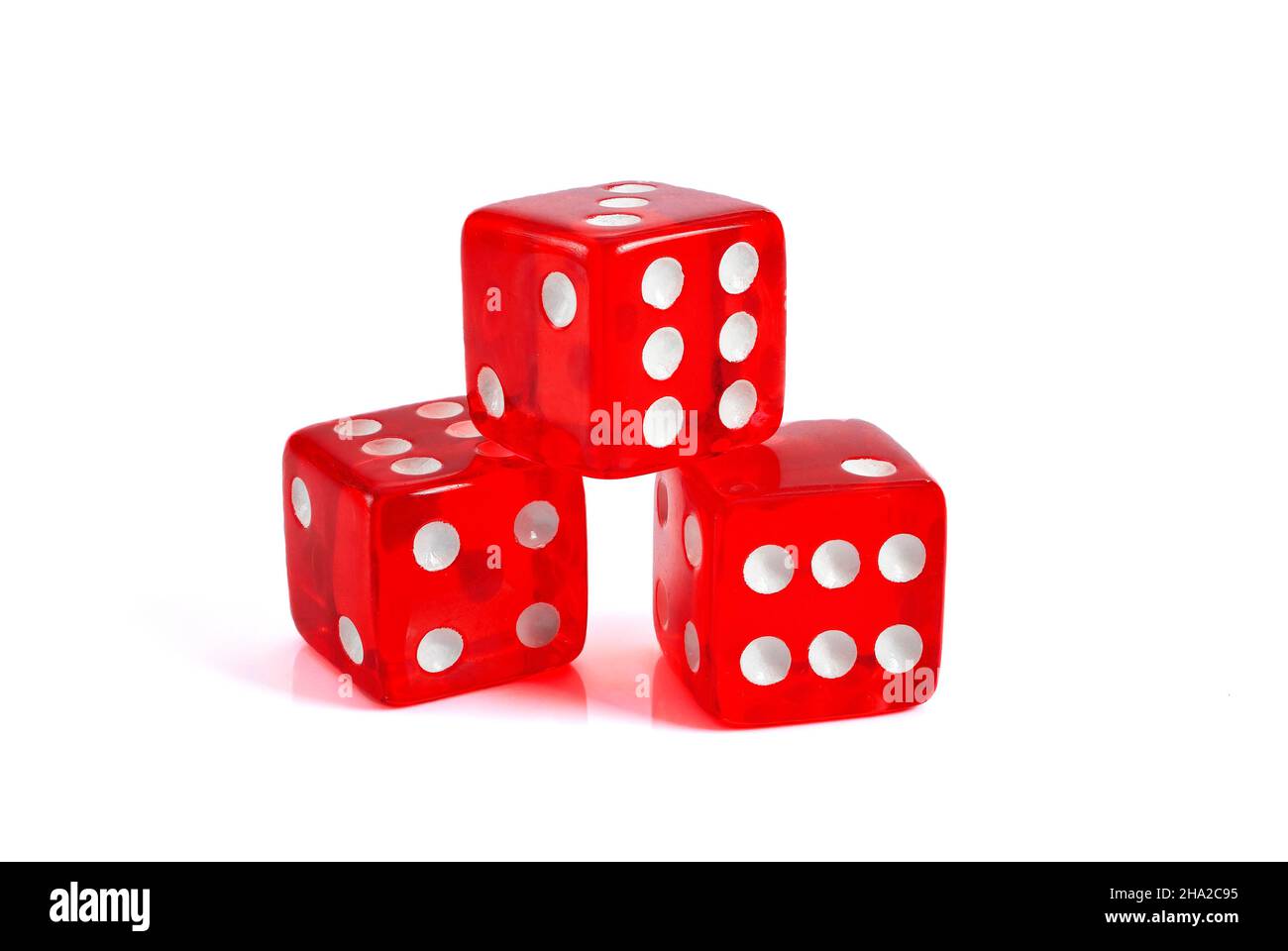 Three red dice isolated on white background Stock Photo - Alamy