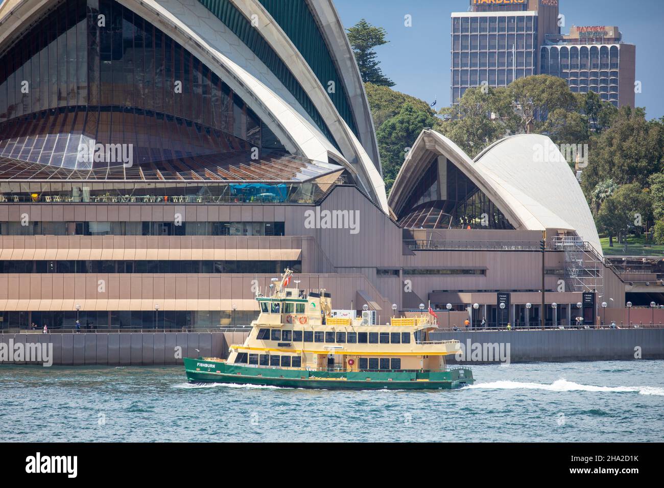 Sydney ferry named MV Fishburn passes the famous Sydney Opera House on ...