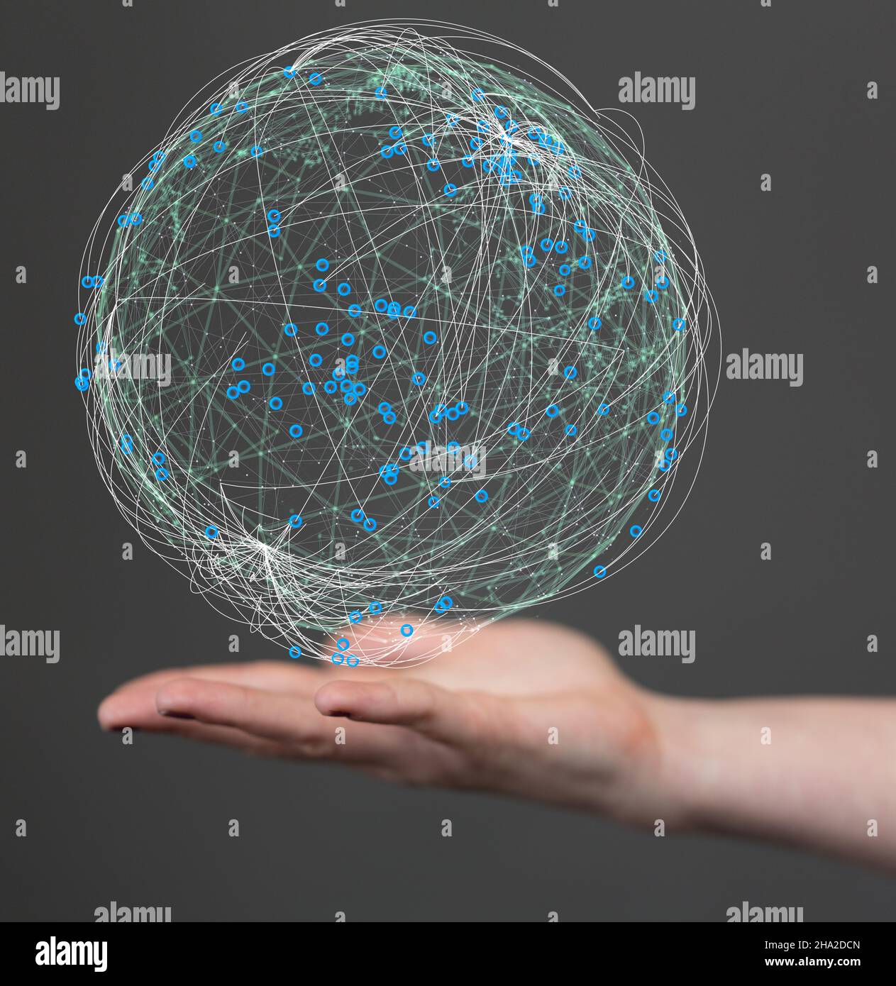 3D rendered network sphere in person's hand Stock Photo - Alamy