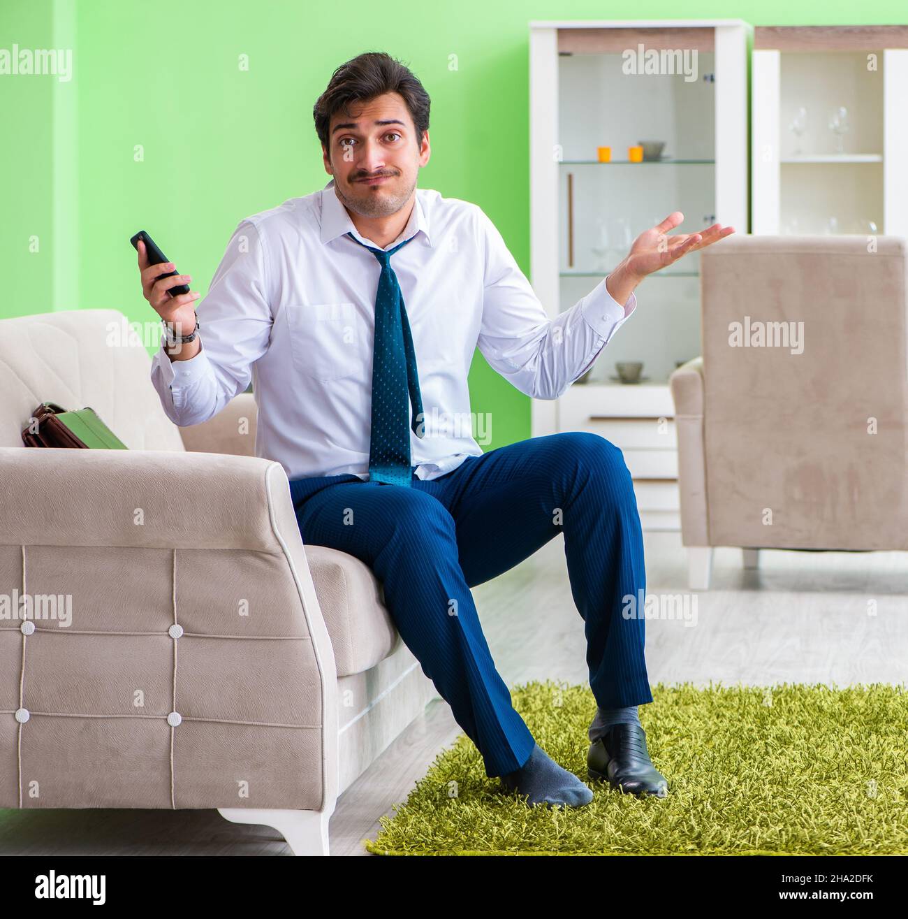 The man dressing up and late for work Stock Photo - Alamy