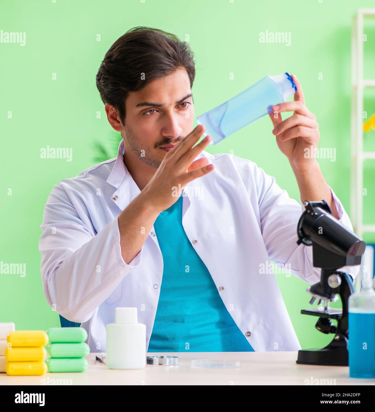 The chemist testing soap in the lab Stock Photo - Alamy