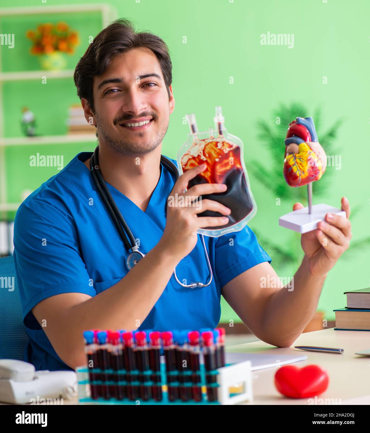 The doctor doing blood analysis in the lab Stock Photo - Alamy