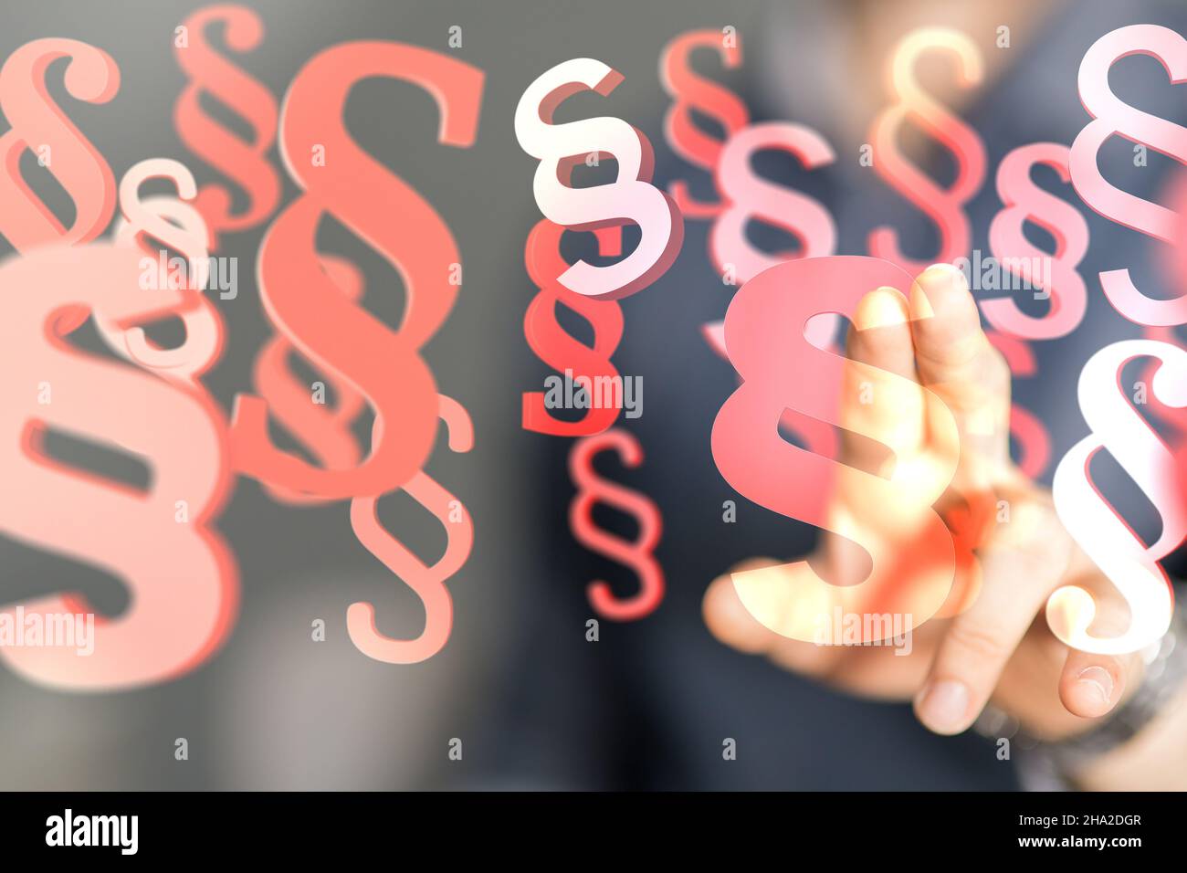 Man tapping on 3D rendered paragraph symbols - law and justice concept ...