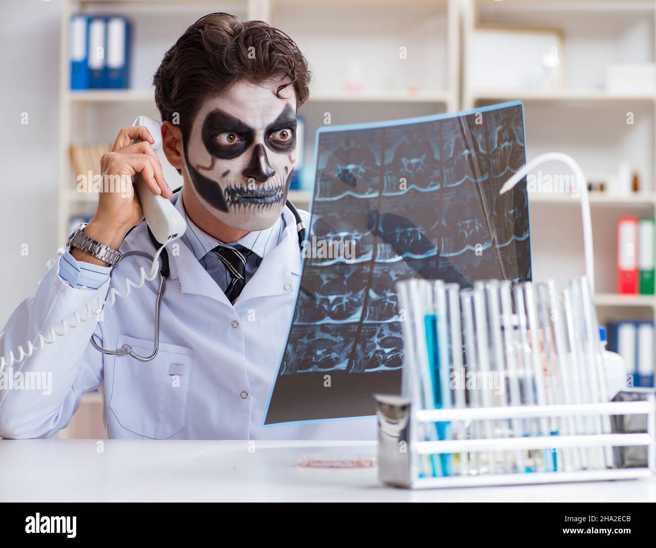 The scary monster doctor working in lab Stock Photo - Alamy