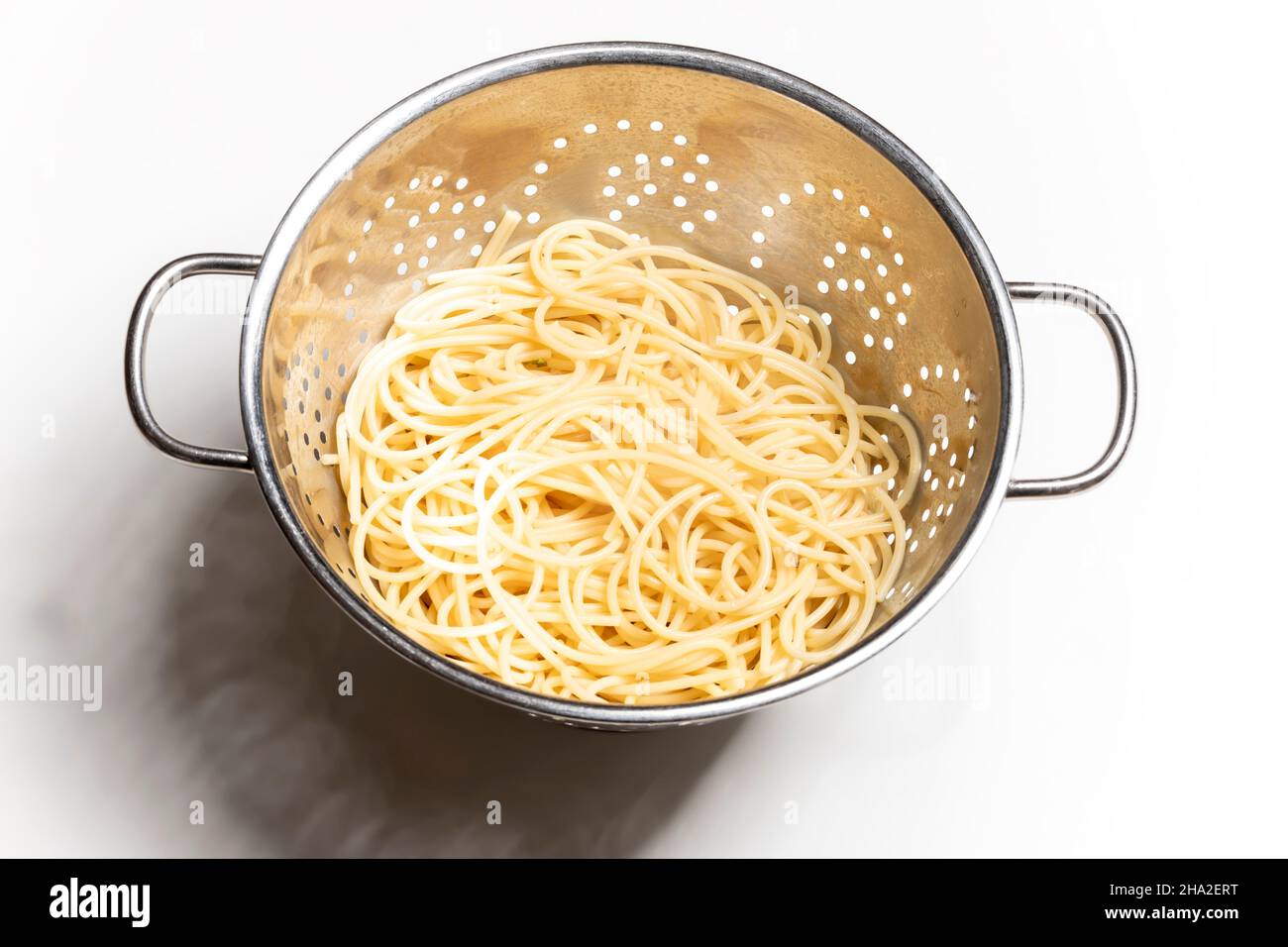 spaghetti pasta in a colander Stock Photo - Alamy