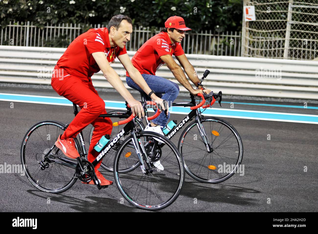Carlos Sainz Jr (ESP) Ferrari rides the circuit with Riccardo Adami ...