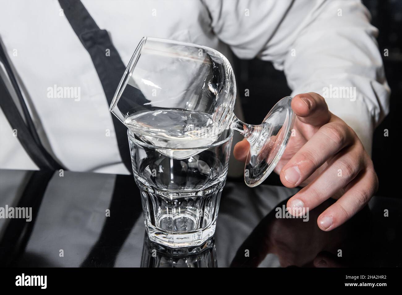 The process of preparing an alcoholic hot cocktail with Italian liqueur ...