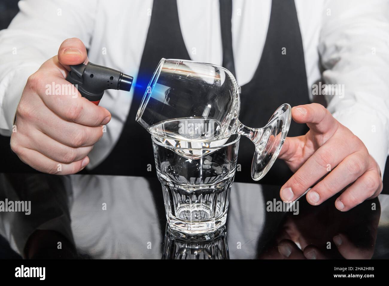 The process of preparing an alcoholic hot cocktail with Italian liqueur ...