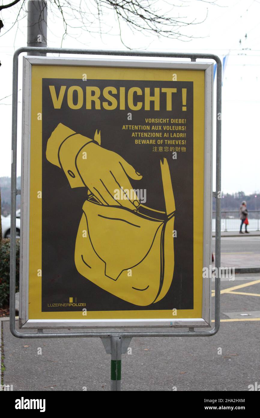 Sign warning against pickpockets and thieves in Lucerne, Switzerland ...