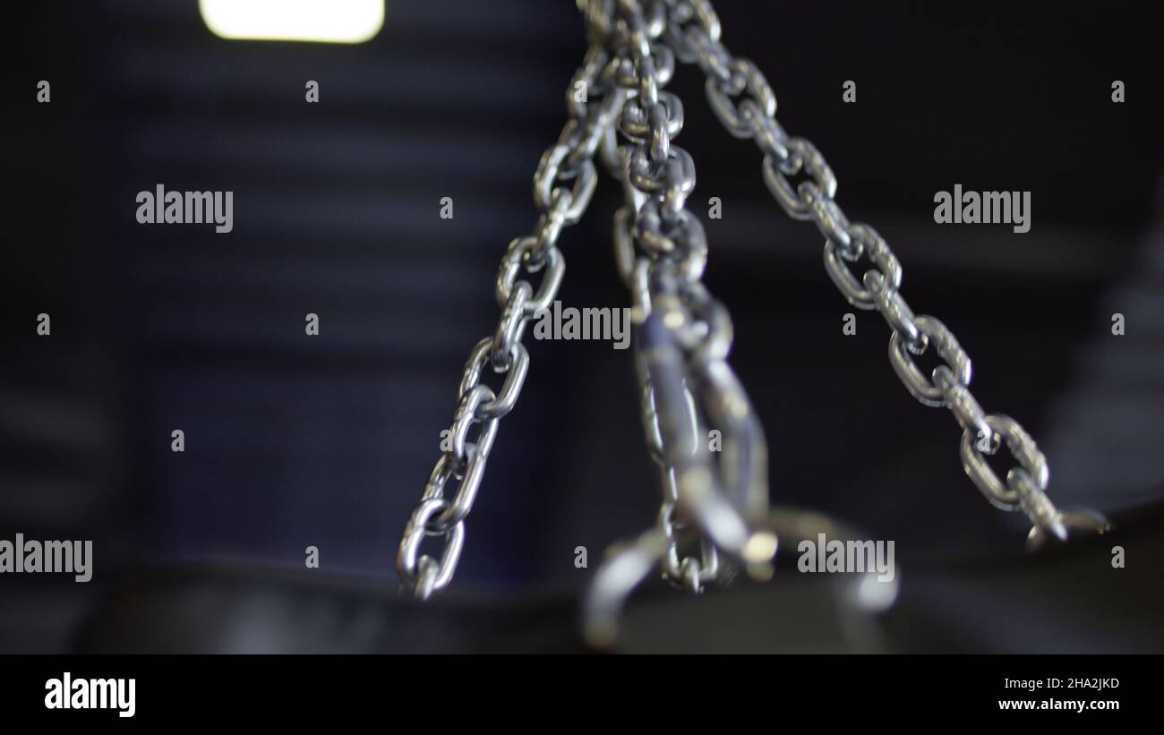 punching bag hanging in the gym on the chains. Punching bag chain Stock ...