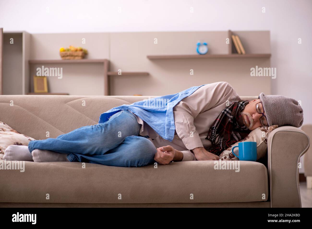 Old man pensioner suffering at home Stock Photo - Alamy