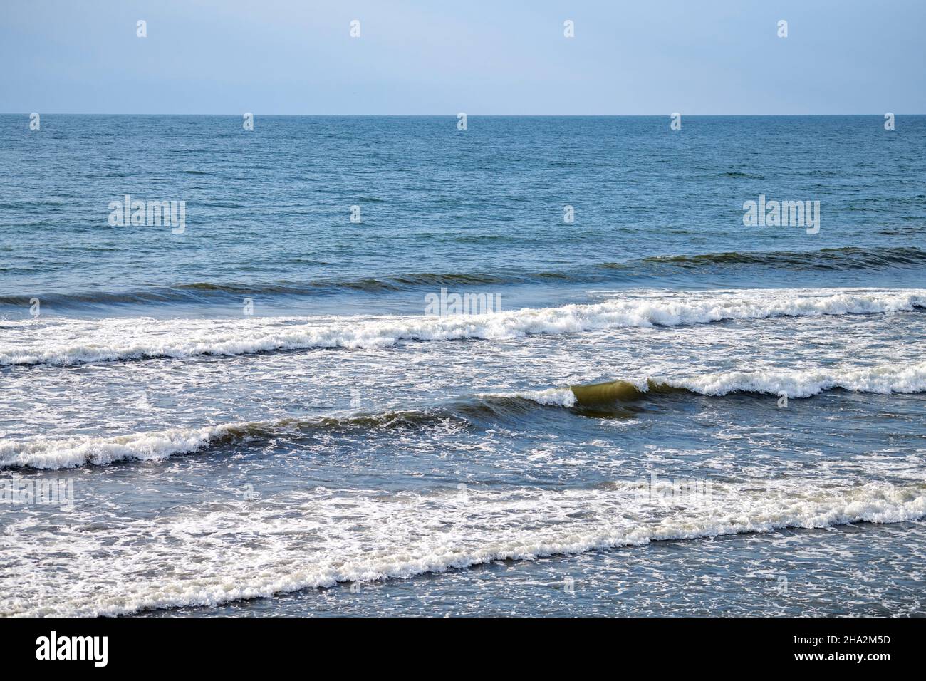 Deep blue sea waters splashing with foamy waves. Seaside view of ocean ...