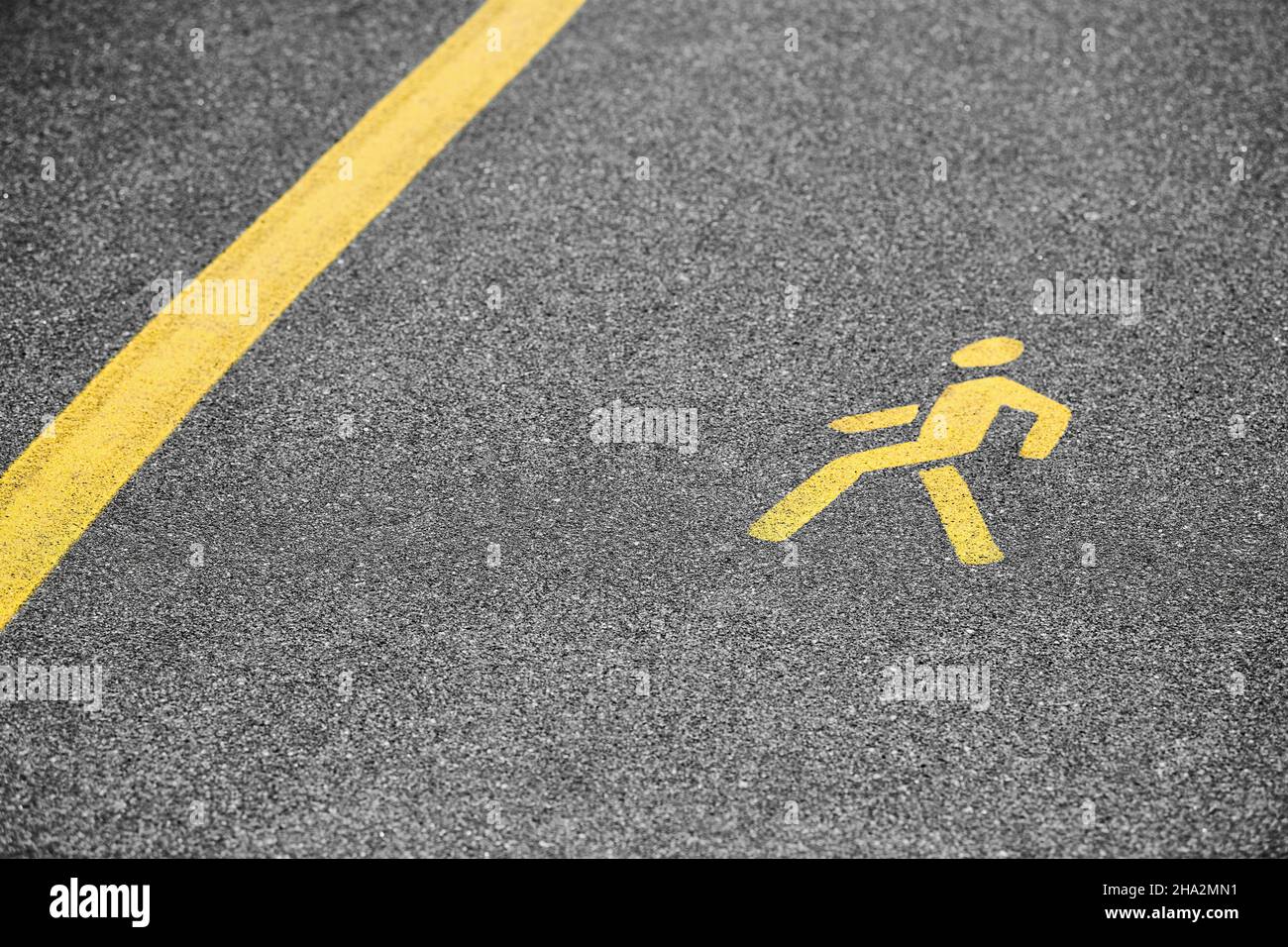 Yellow pedestrian sign on sidewalk, safe road traffic near highway ...