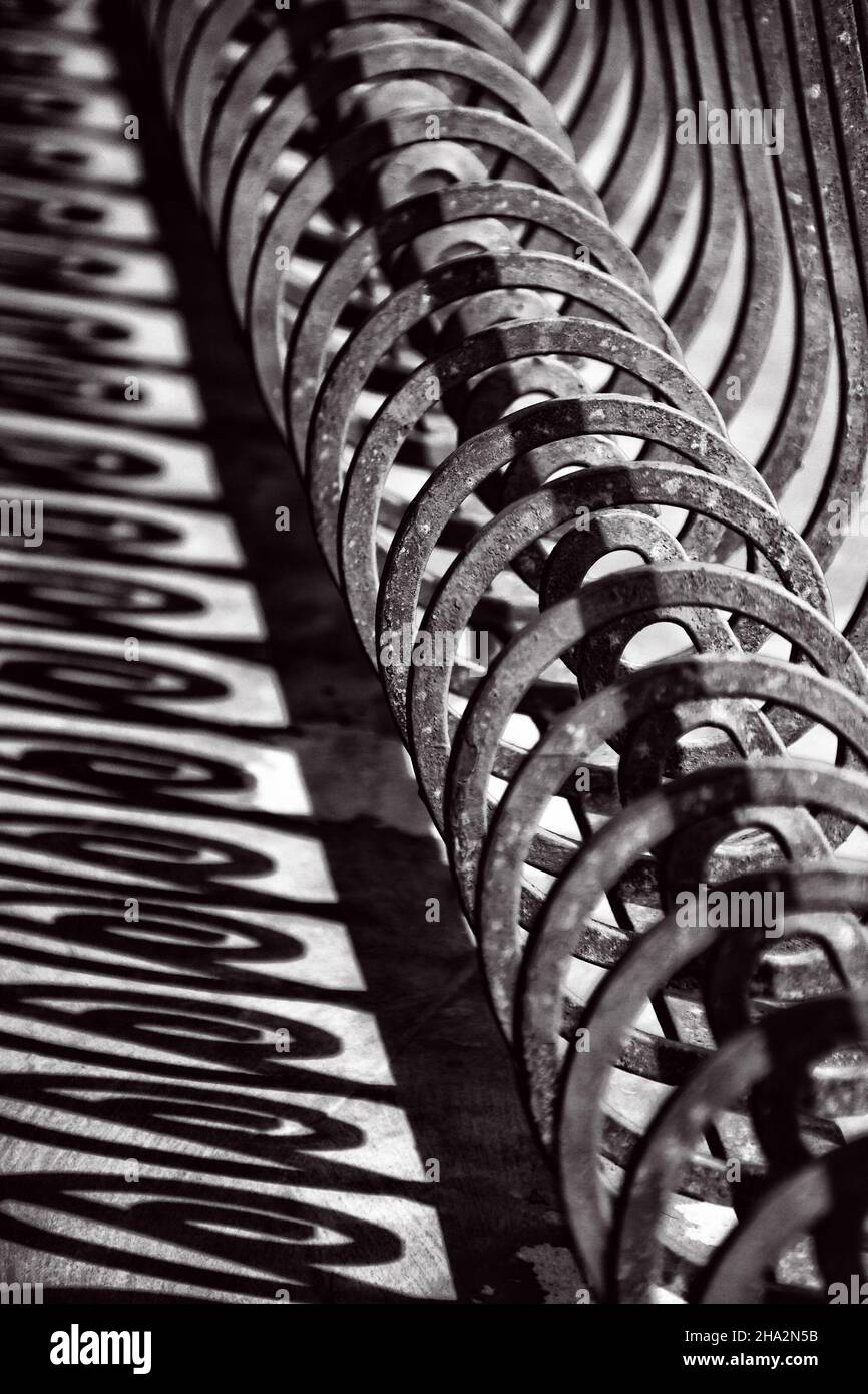 Vertical greyscale shot of railing patterns and shadows in Malta Stock ...