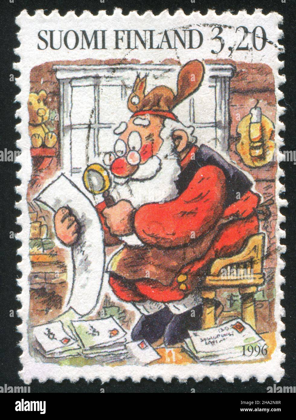 FINLAND - CIRCA 1996: stamp printed by Finland, shows Santa Reading ...