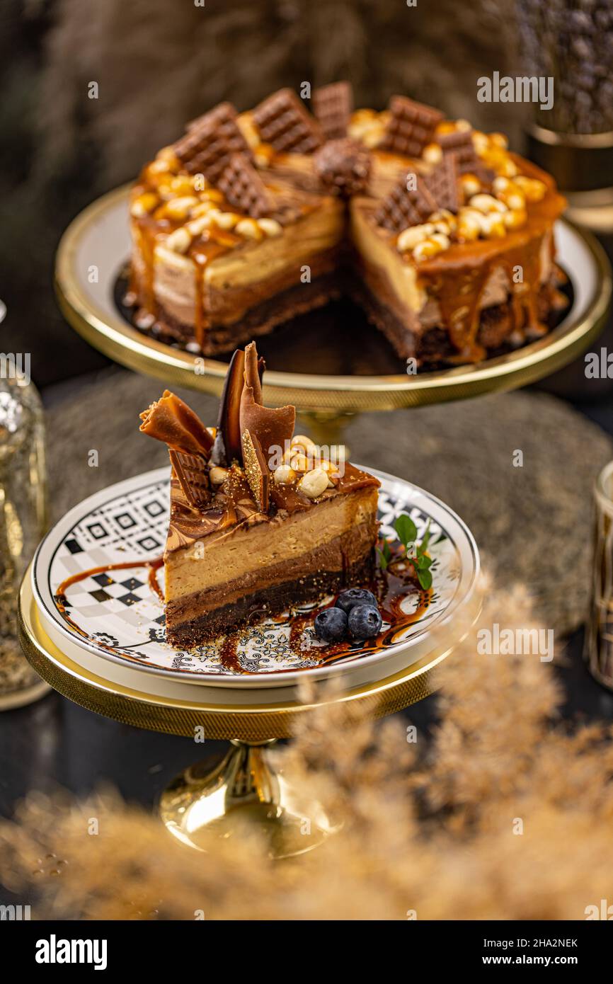 Fancy layered chocolate cake, cake lovers concept Stock Photo - Alamy