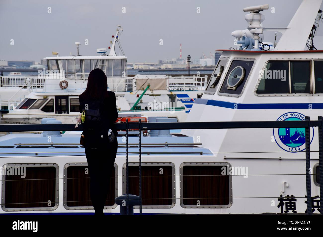 Person standing at front of boat hi-res stock photography and images ...