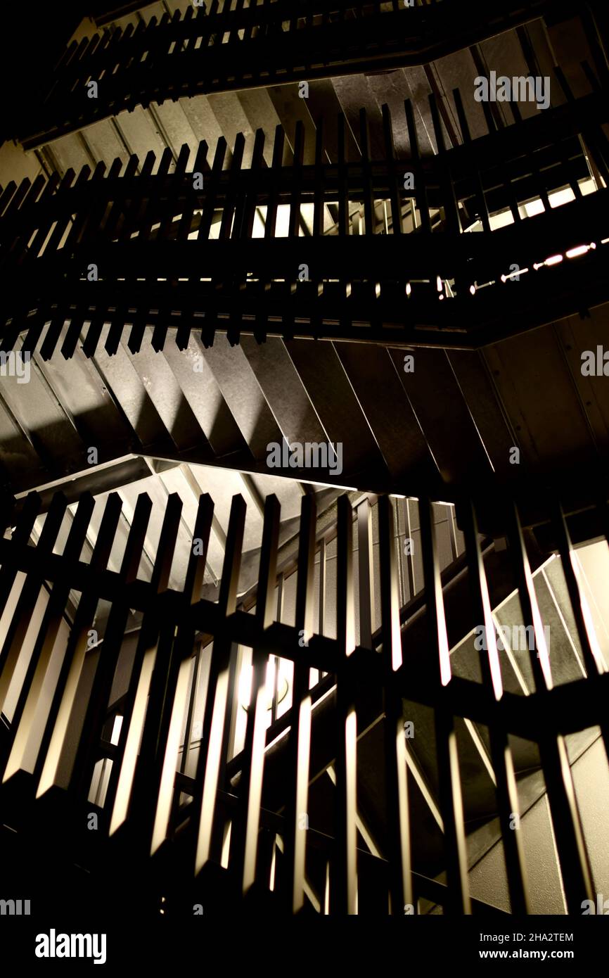 Abstract view of lighting through a fire escape guard rail Stock Photo ...