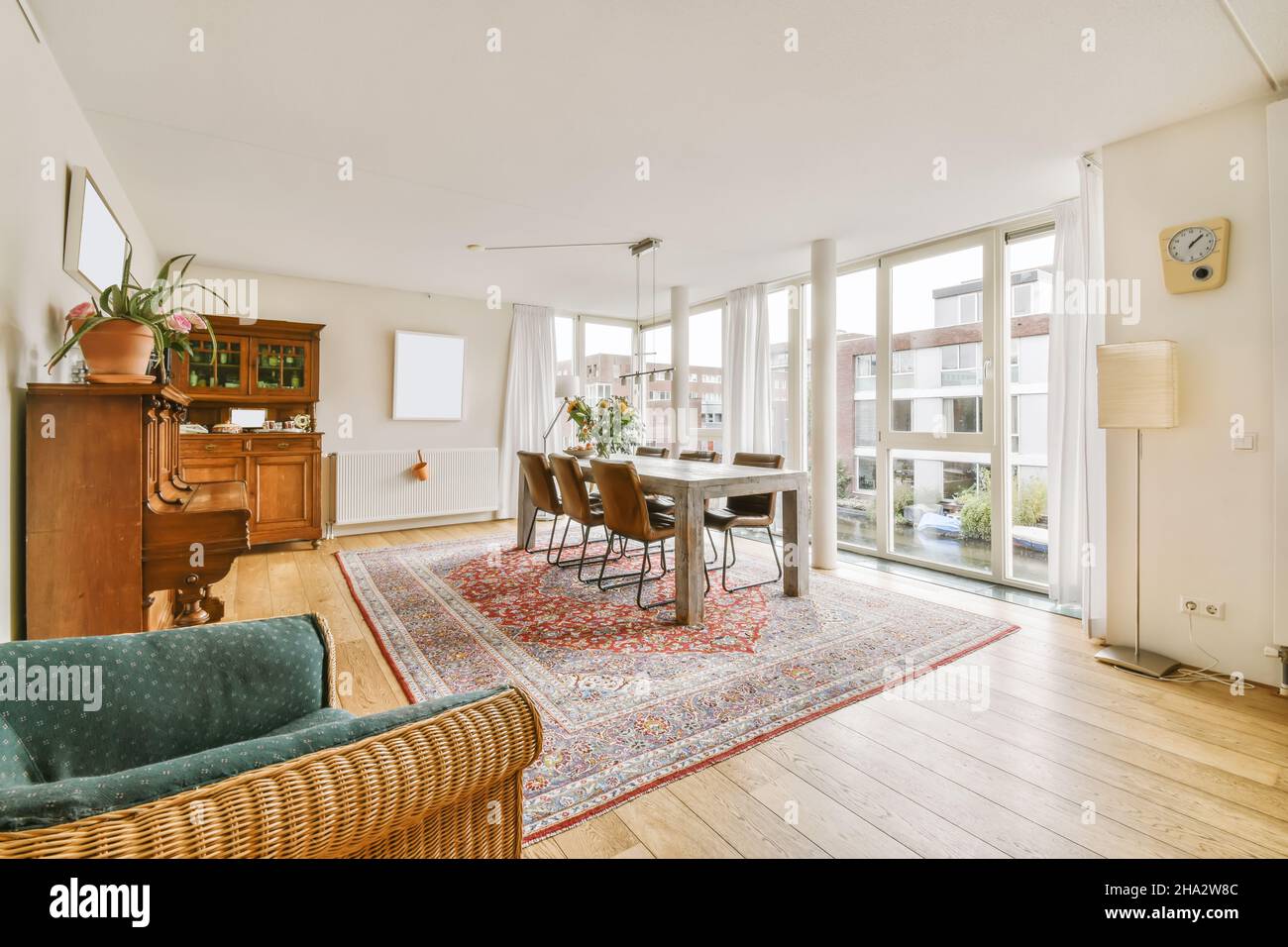 Lovely expansive dining area with large table and large full-length ...