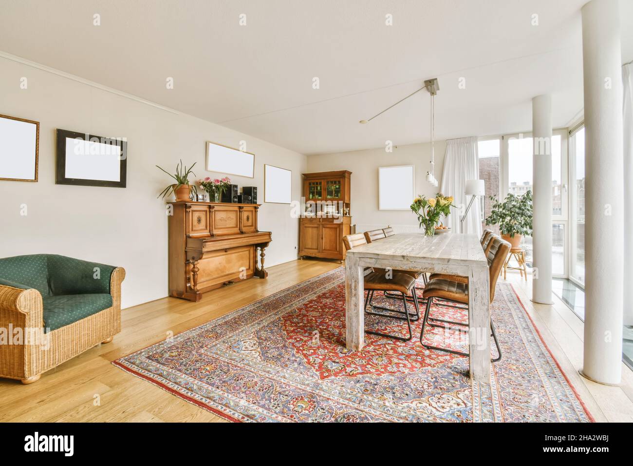 Lovely expansive dining area with large table and large full-length ...