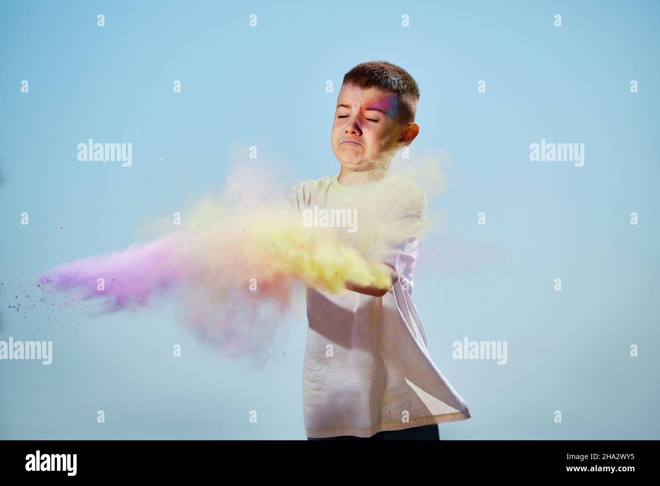 happy little child girl throw bright paints Stock Photo - Alamy