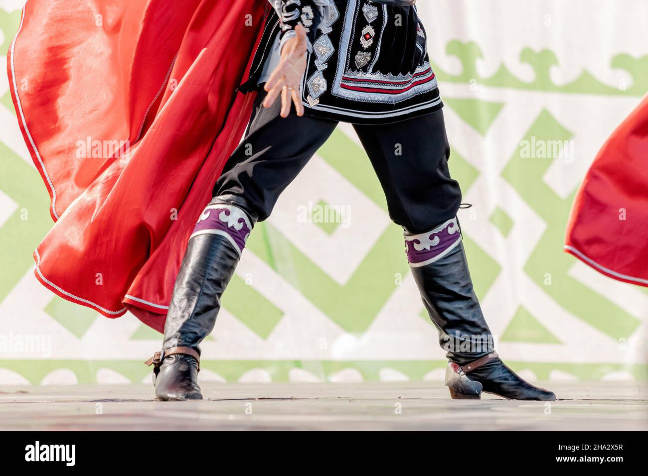 Man in national Bashkir clothes perform traditional dances of warriors ...
