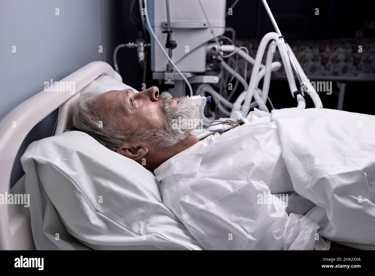 covid-19 patient with Endotracheal Tube In Mouth Lying On Medical Couch ...