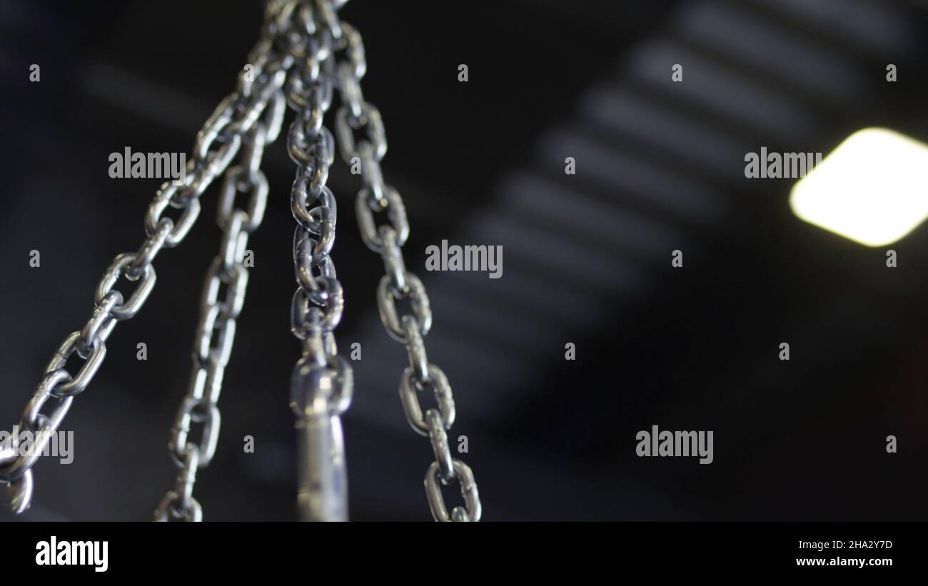 punching bag hanging in the gym on the chains. Punching bag chain Stock ...