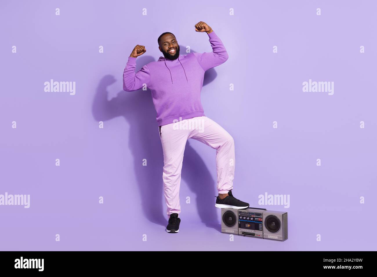 Full length body size view of attractive cheerful guy dj with tape ...