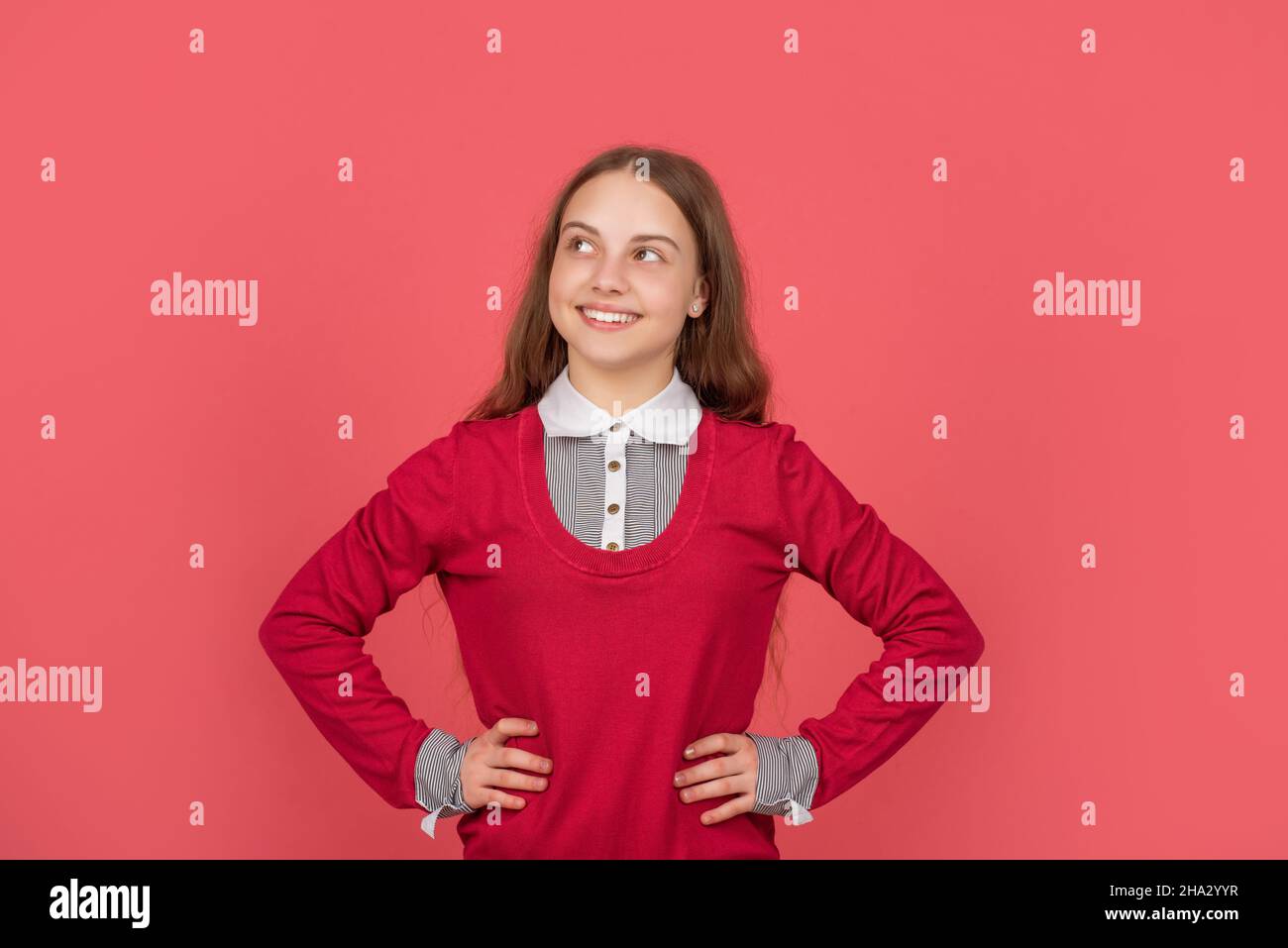 happy child in school uniform on red background, childhood Stock Photo ...