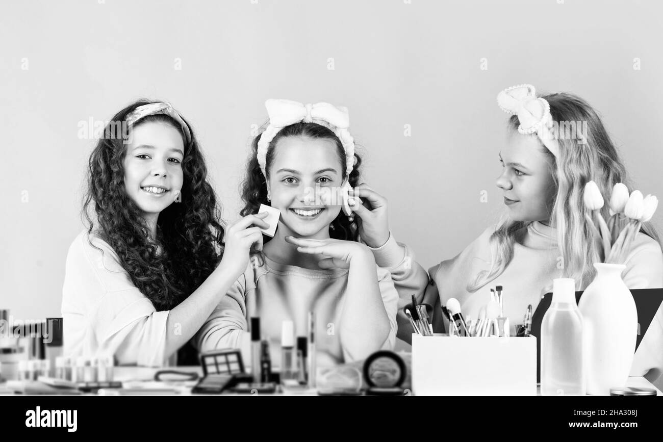 Cleanse carefully. Beauty and fashion. Girls doing makeup together ...