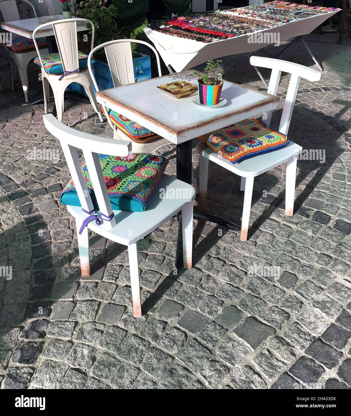 Retro style cafe outdoor with concrete wall Stock Photo - Alamy