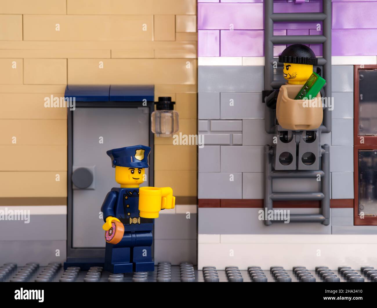 Man climing ladder hi-res stock photography and images - Alamy