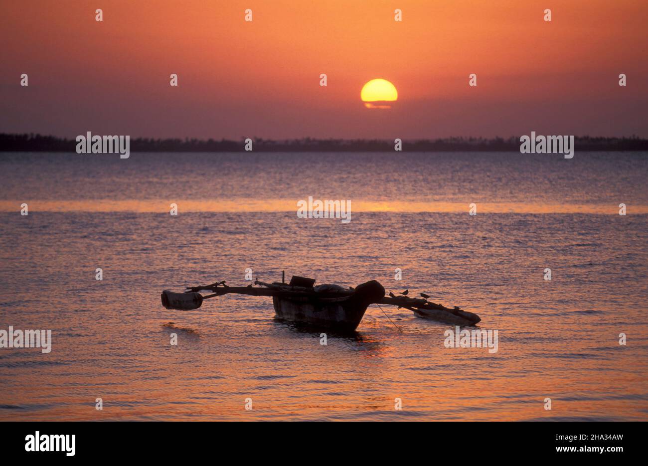 a sunset on the Beach at the Chwaka Bay near the Village of Bwejuu on ...